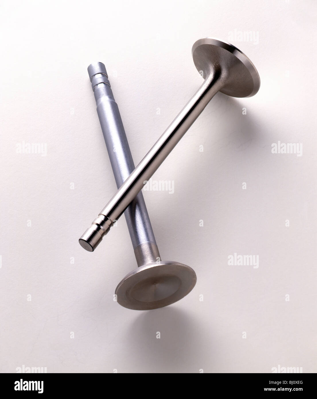 Valve parts for an automobile engine Stock Photo - Alamy