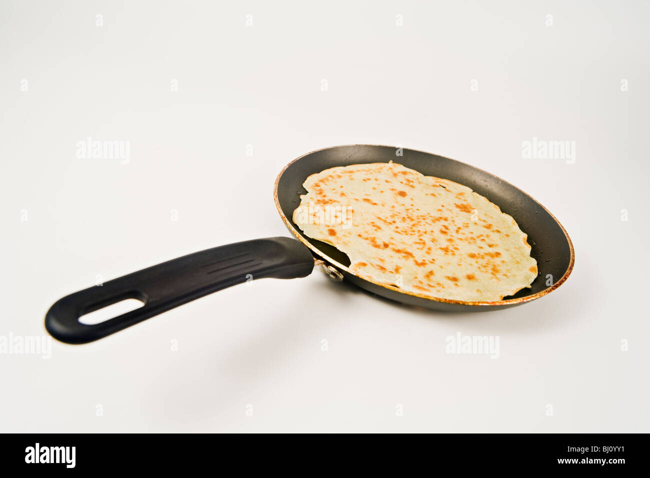 pancake in a pan Stock Photo - Alamy