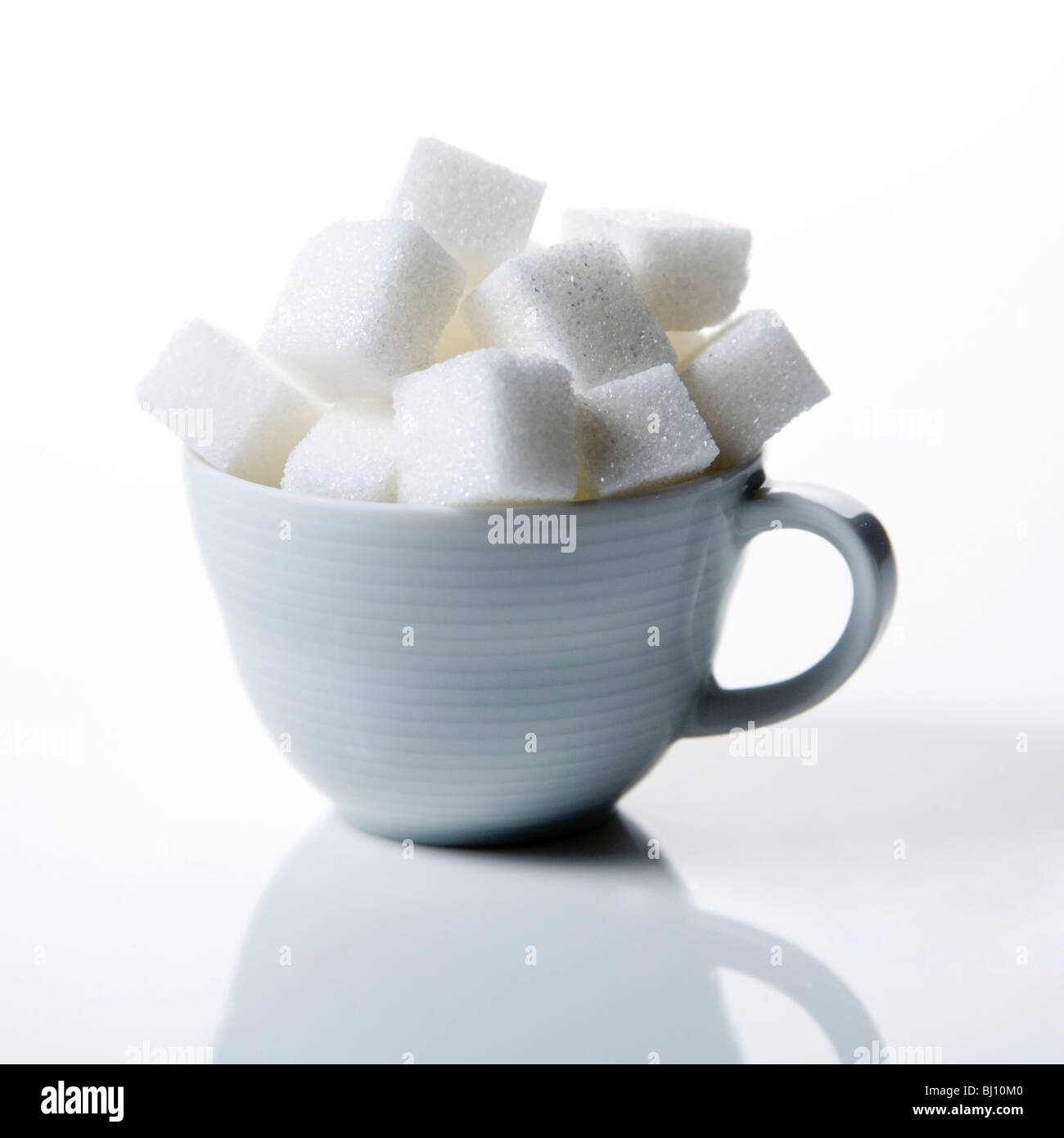 sugar cubes in a cup Stock Photo - Alamy