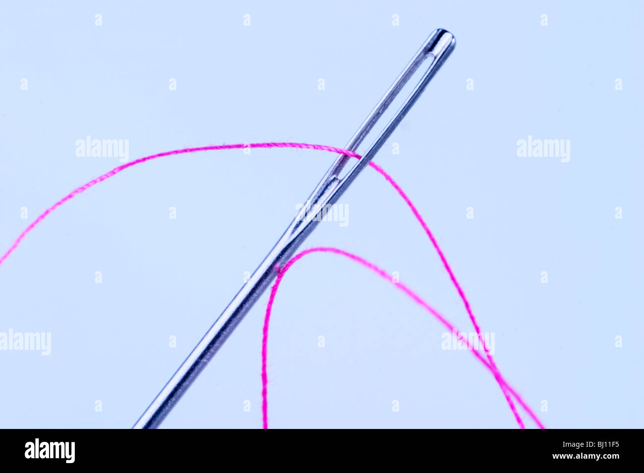 twine with needle Stock Photo - Alamy