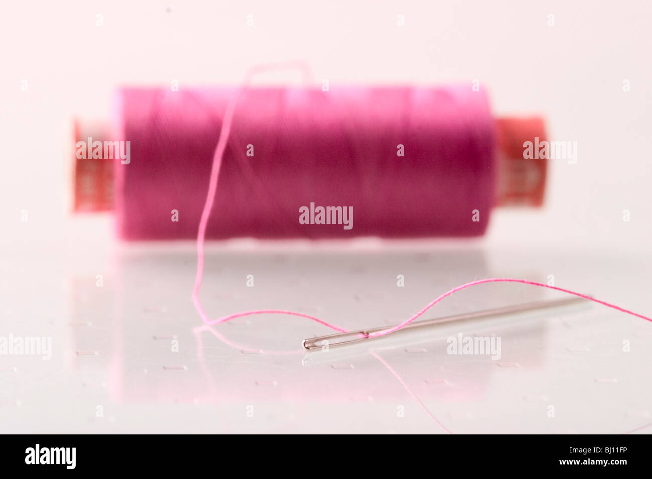 twine with needle Stock Photo - Alamy