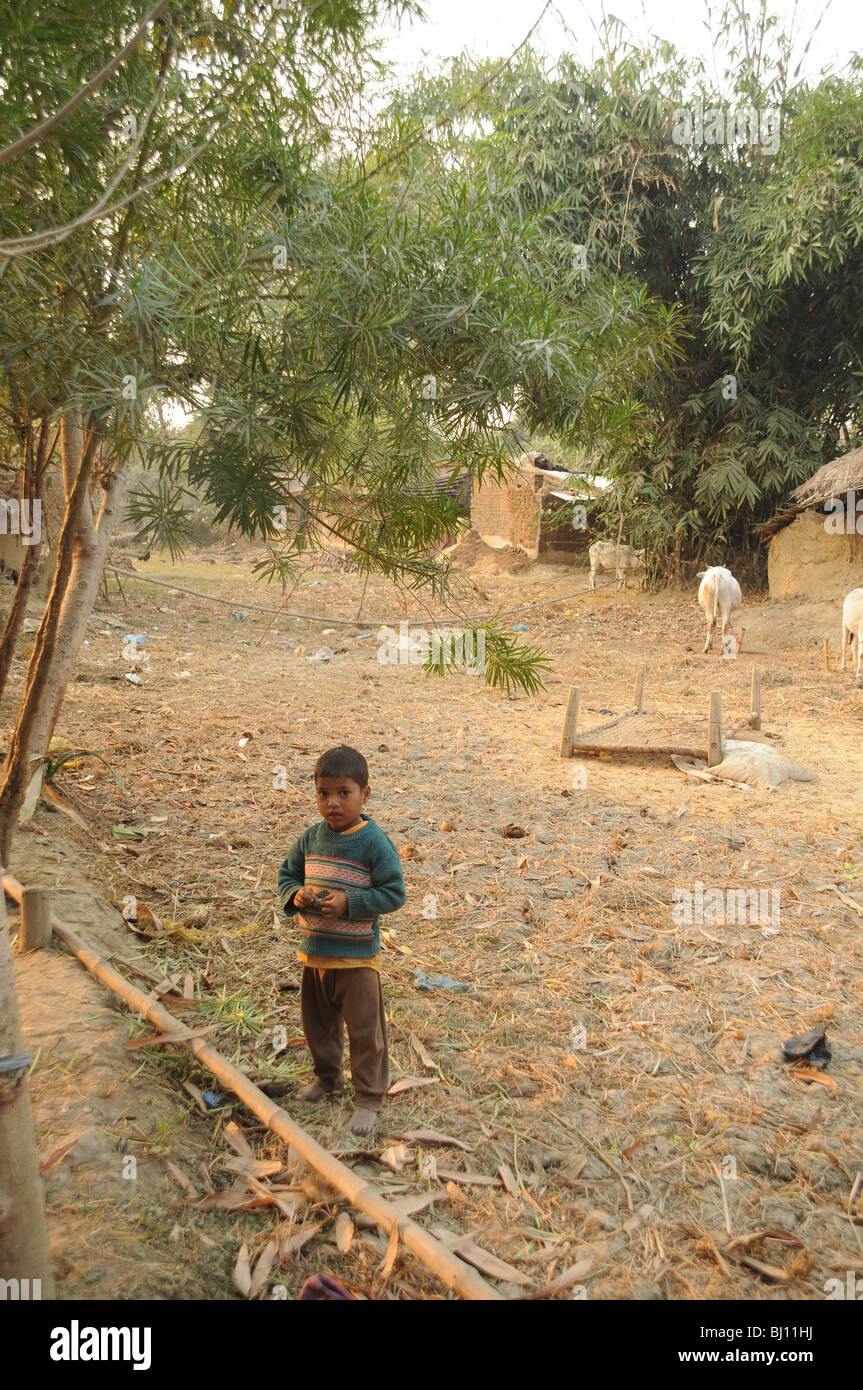 boy stands in his village Stock Photo - Alamy