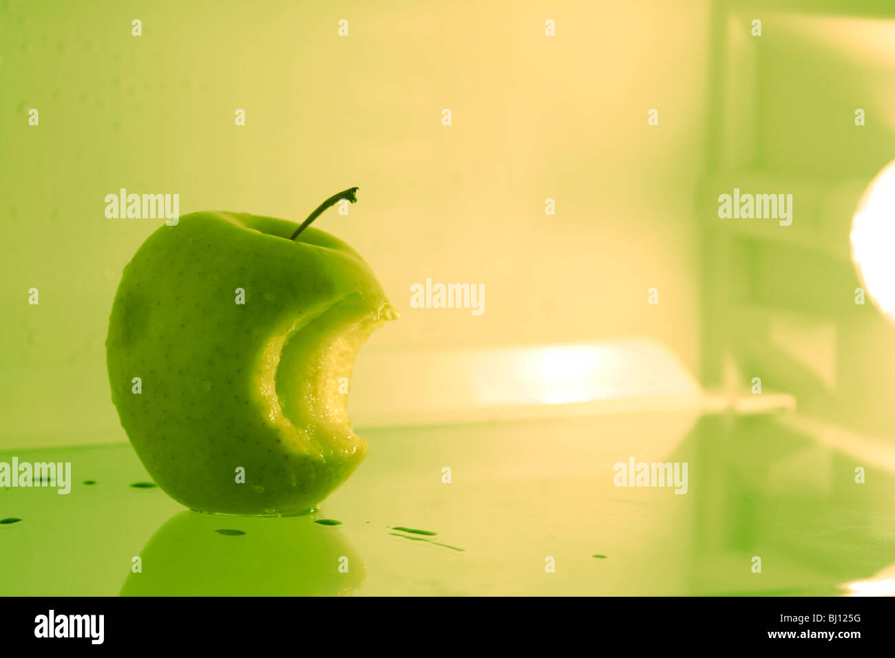Apple in a refrigerator Stock Photo - Alamy