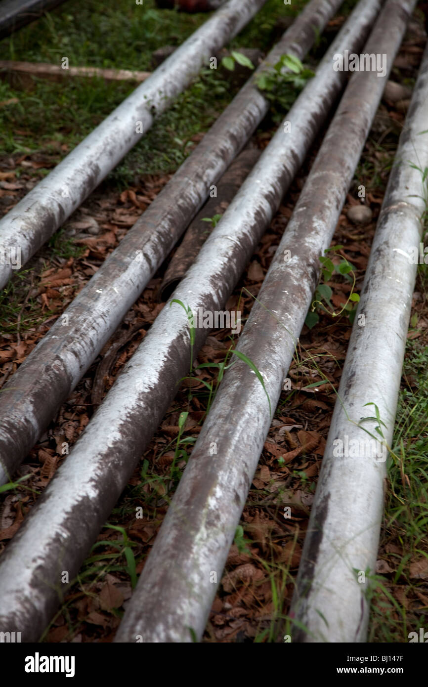 Oil waste pits and pipes in the Ecuadorian Amazon created by Texaco Oil ...