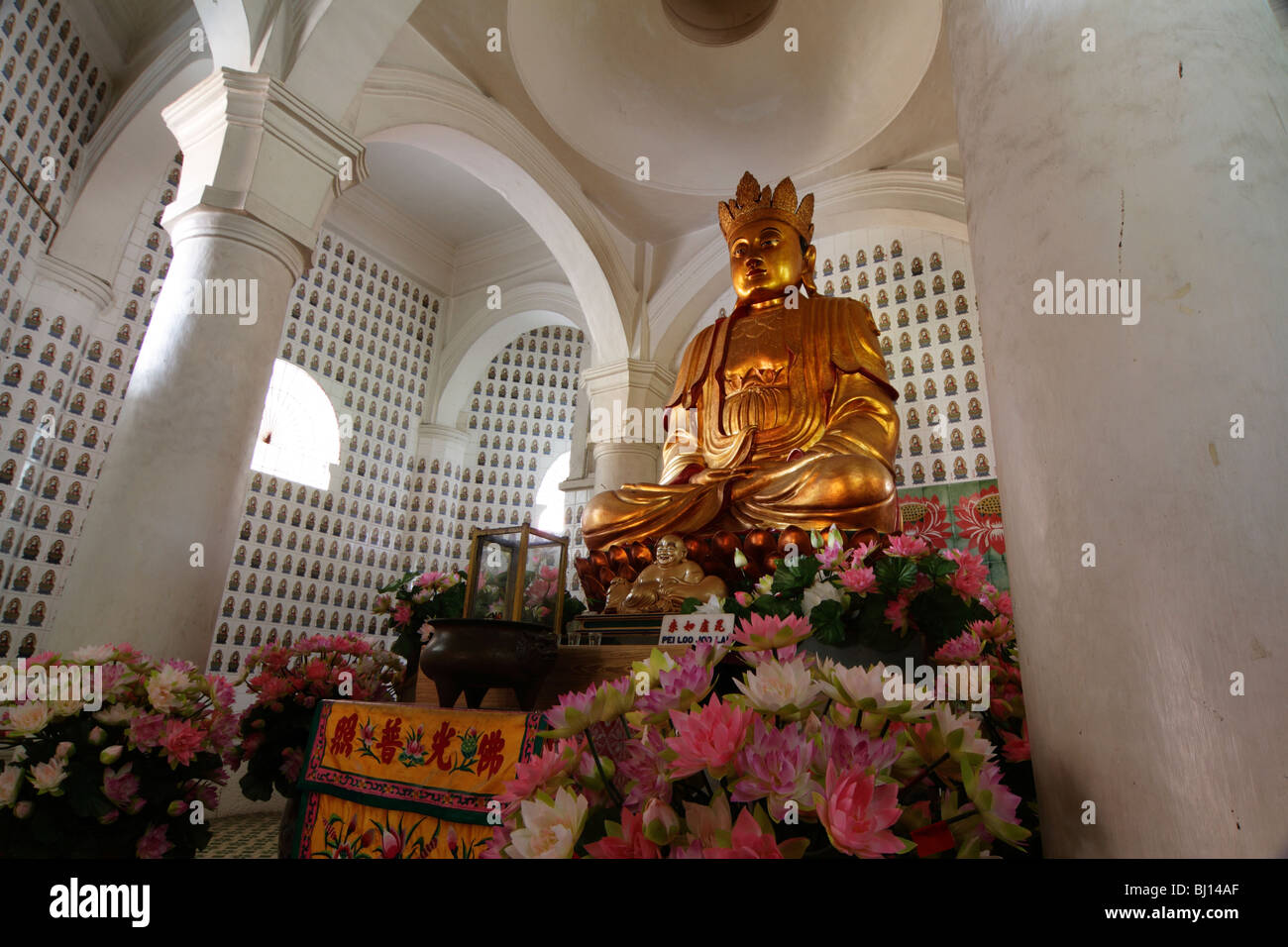 A statue of the Buddhist deity Pei Loo Joo Lai inside a stupa at Kek ...