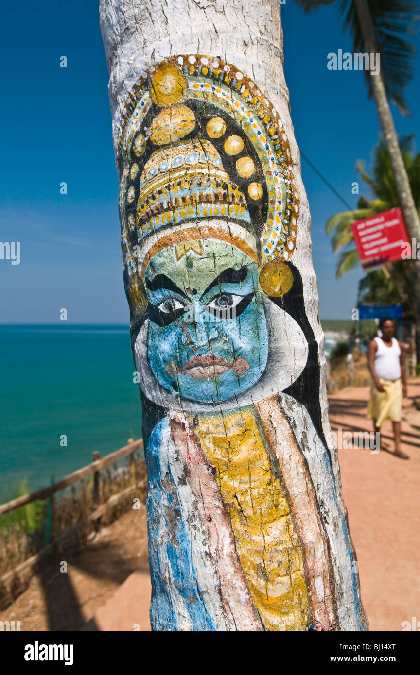 Painted tree trunk Kathakali image North Cliff Varkala Kerala India ...