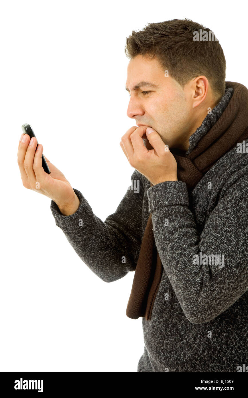 young casual man with a phone, isolated on white Stock Photo - Alamy