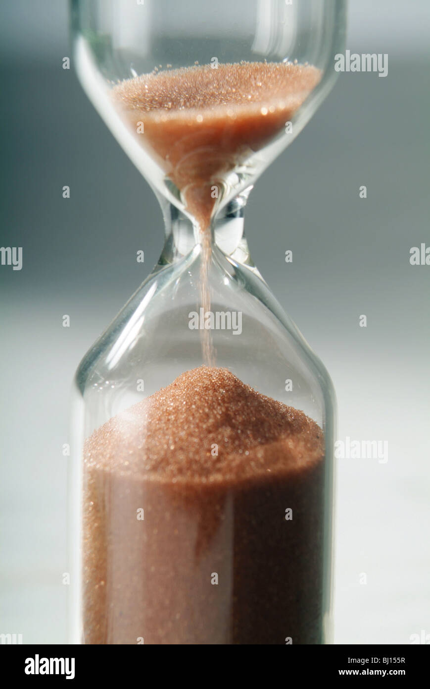 Sandglass measuring time Stock Photo - Alamy