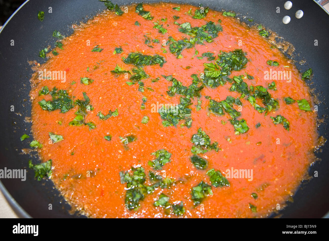 Italian tomato sauce in pan for pasta Stock Photo - Alamy