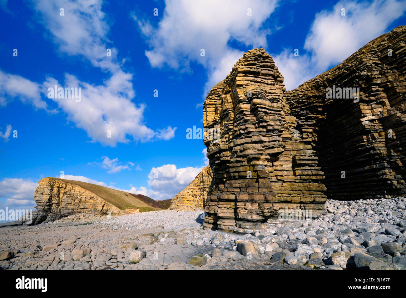 Cliffs at Nash point in South Wales viewed from the rocky Limestone and ...