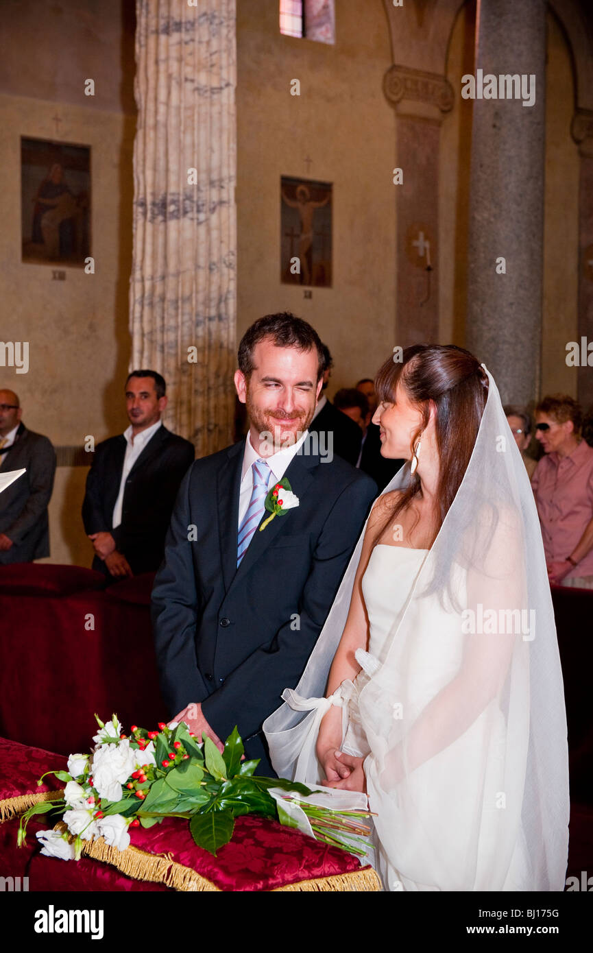 Bride and groom at wedding looking at each other Stock Photo - Alamy