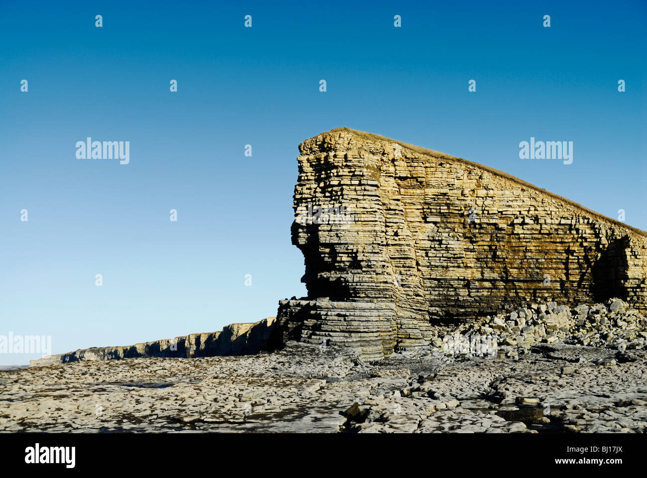 Cliffs at Nash point in South Wales viewed from the rocky Limestone and ...