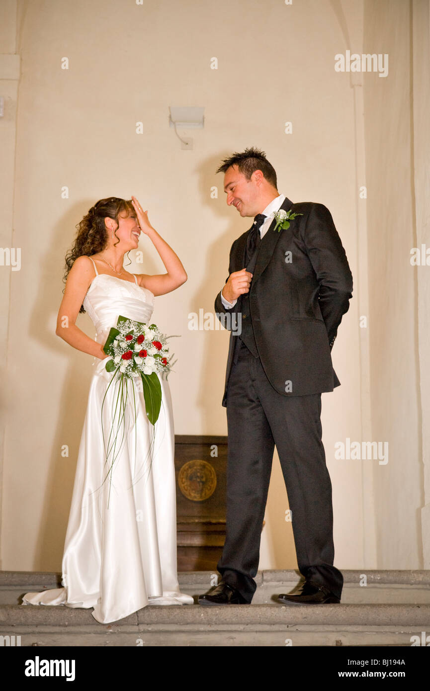 Bride and groom laughing at wedding Stock Photo - Alamy