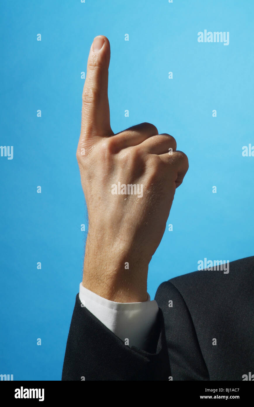 Warning index finger Stock Photo - Alamy