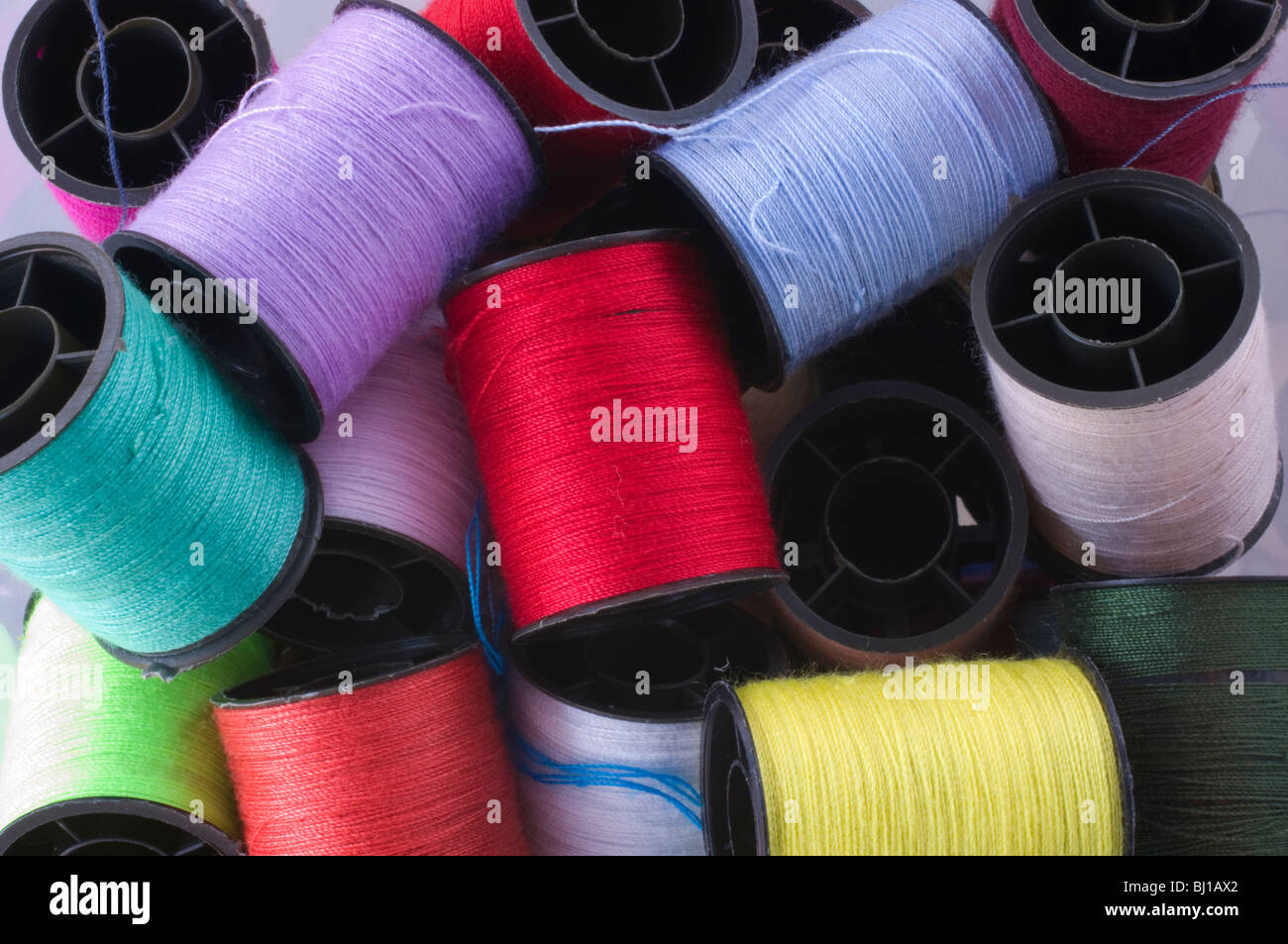 A collection of colourful cotton reels Stock Photo - Alamy