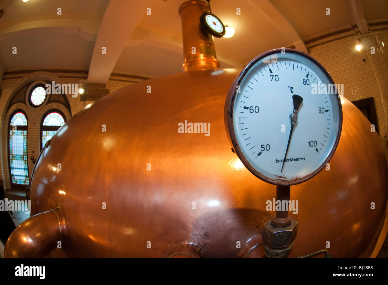 Copper traditional tanks for brewing Heineken beer, Heineken brewery ...