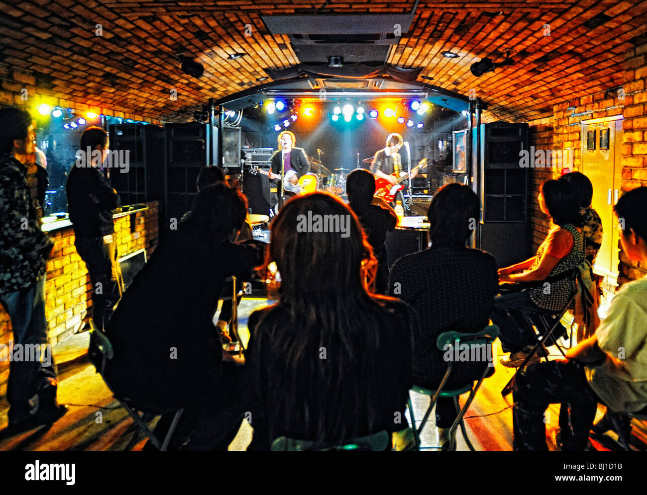 A band performs at a live house in Tokyo Stock Photo - Alamy