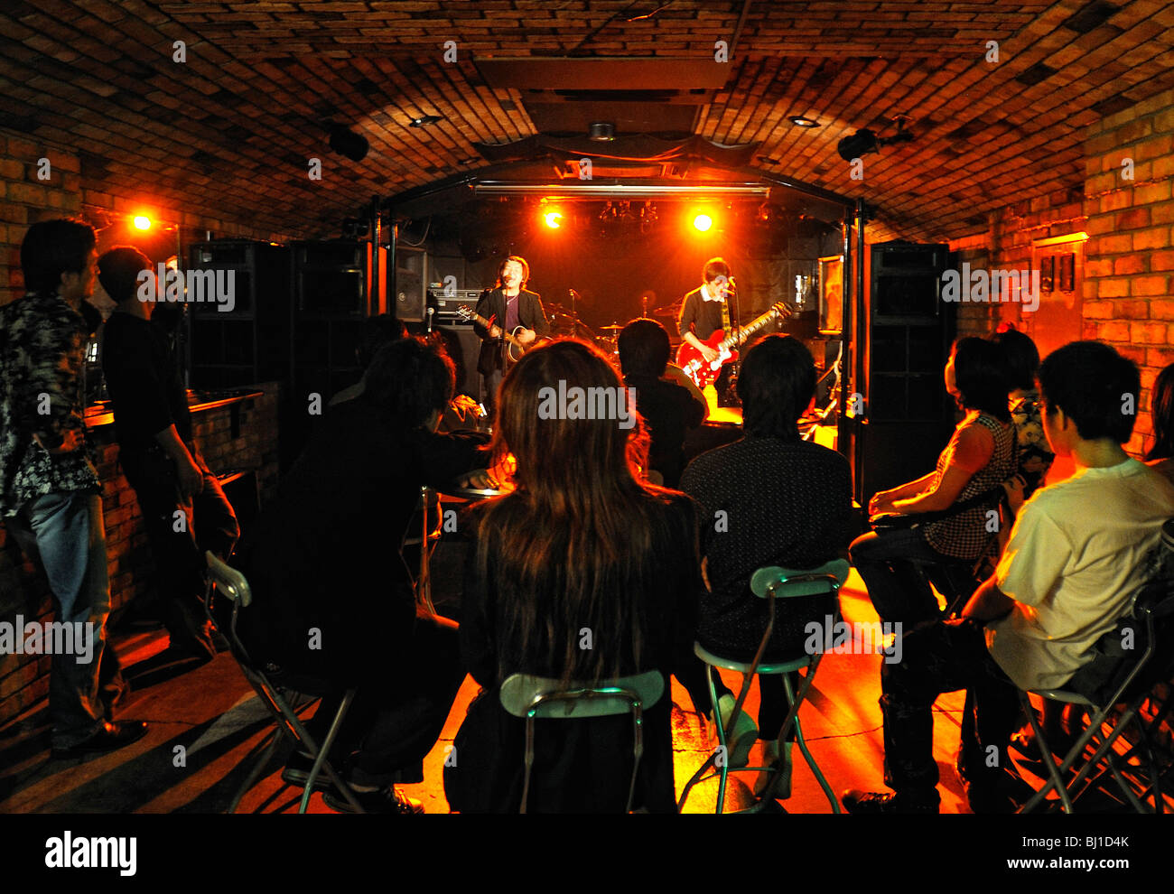 A band performs at a live house in Tokyo Stock Photo - Alamy
