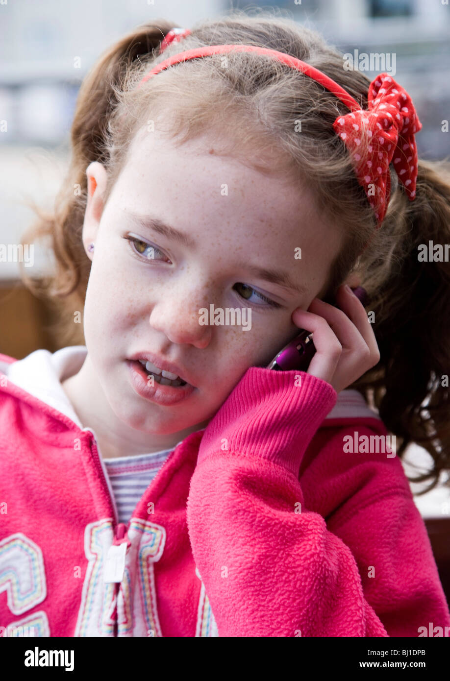Child Using a Mobile Cell Phone Stock Photo - Alamy