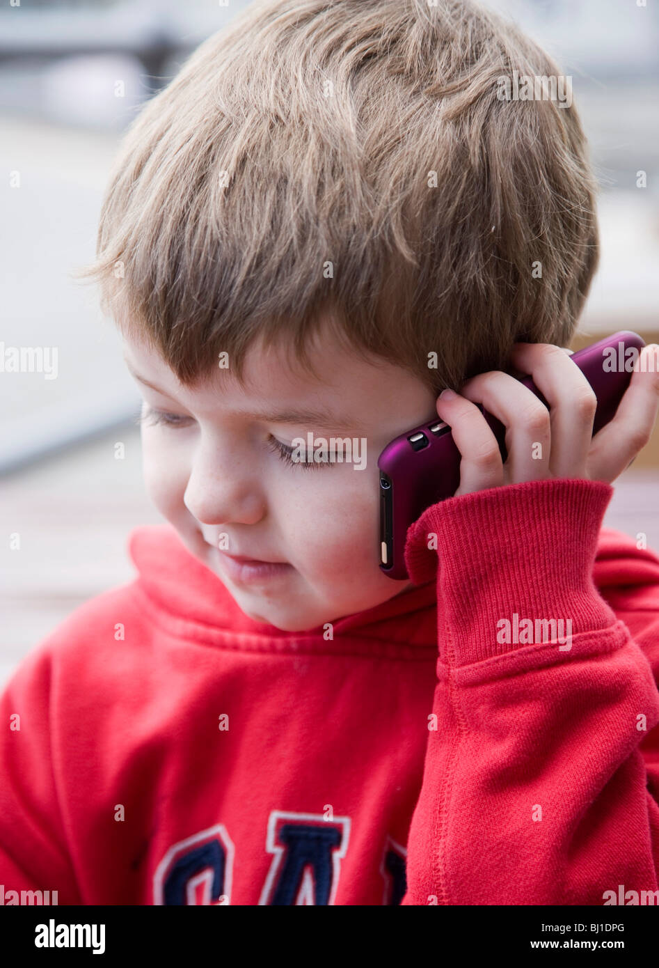 Child Using a Mobile Cell Phone Stock Photo - Alamy