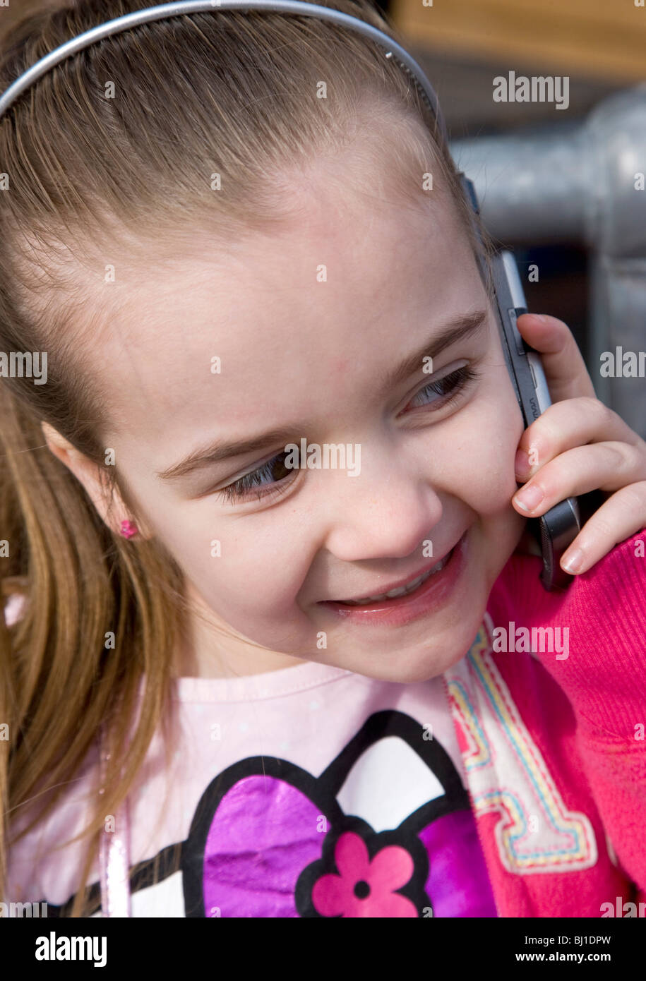 Child Using a Mobile Cell Phone Stock Photo - Alamy