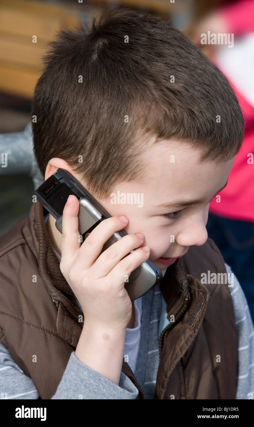 Child Using a Mobile Cell Phone Stock Photo - Alamy