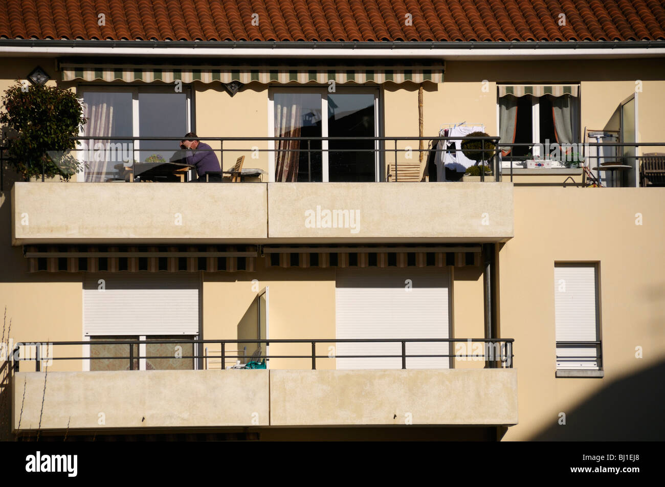Man on french balcony hi-res stock photography and images - Alamy