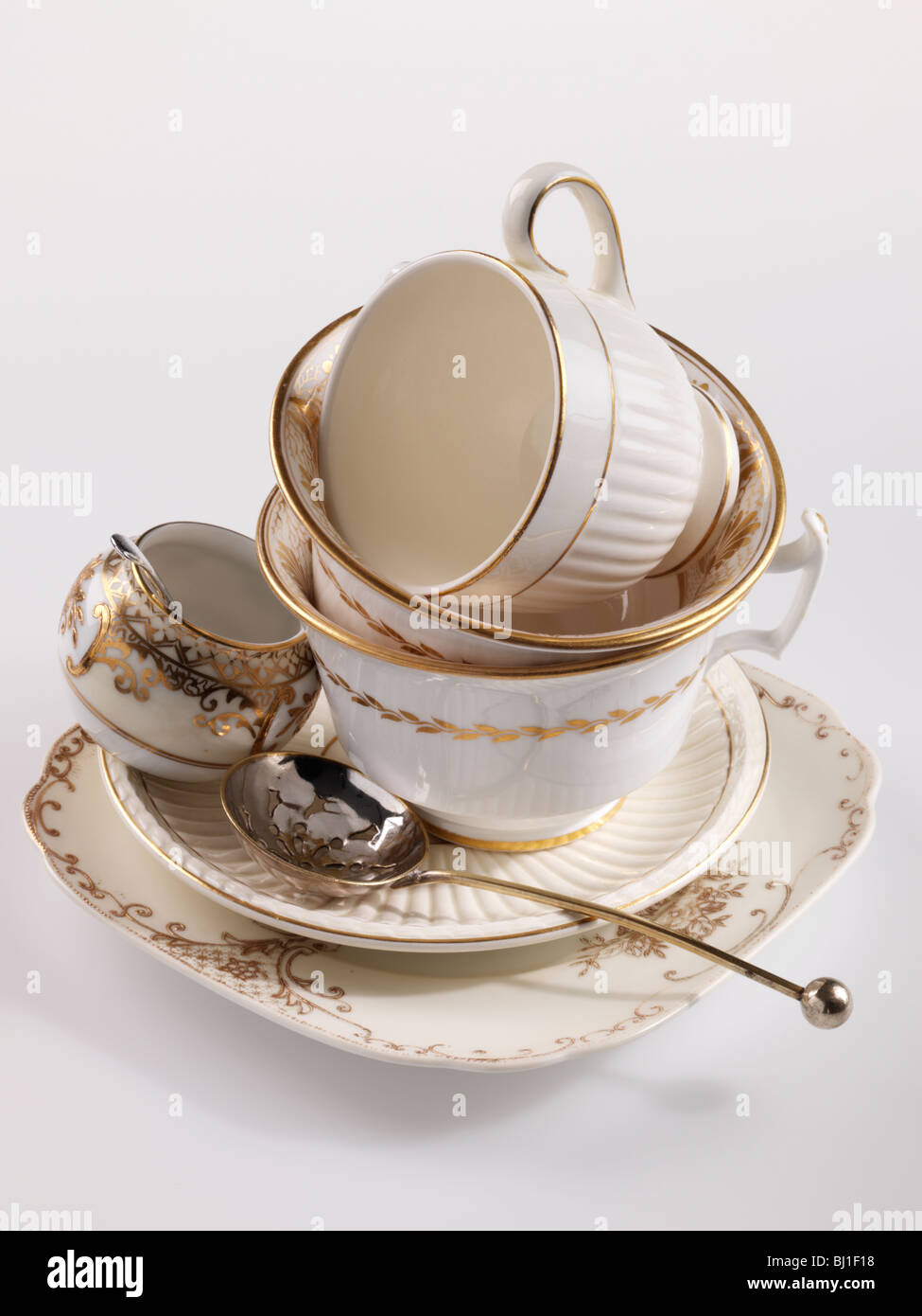 Cream and white antique china Stock Photo - Alamy