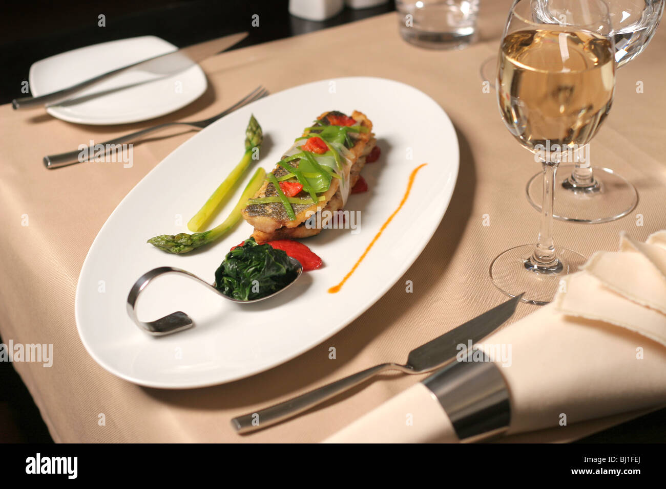 Restaurant table with fish Stock Photo - Alamy