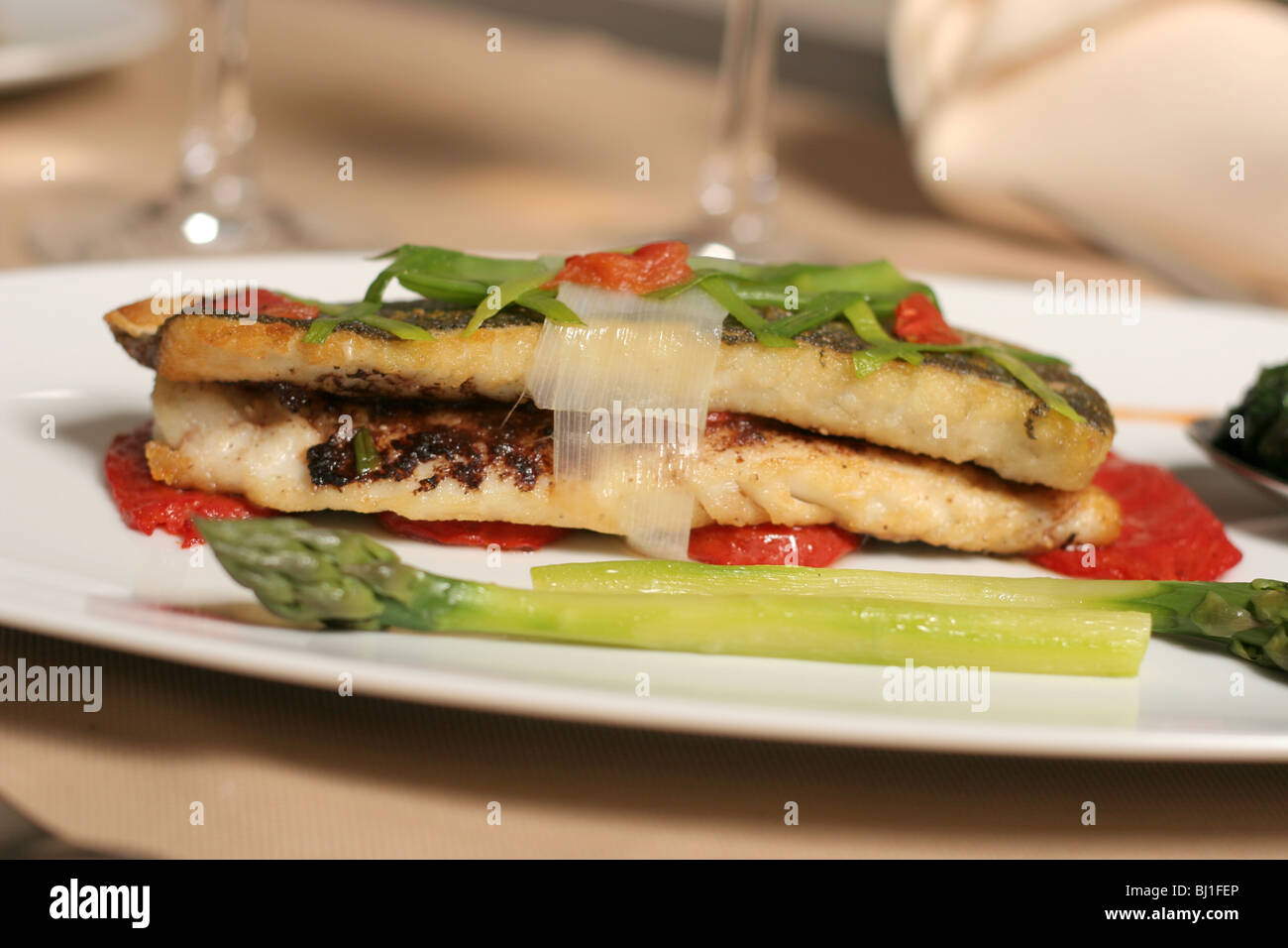 Restaurant table with fish Stock Photo - Alamy