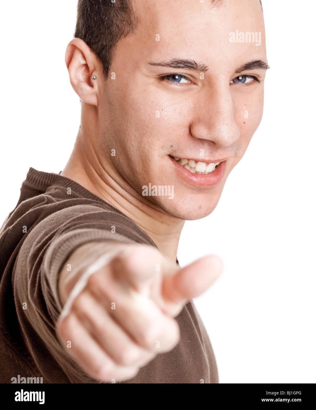 Portrait of a smart guy pointing to something, isolated on white Stock ...