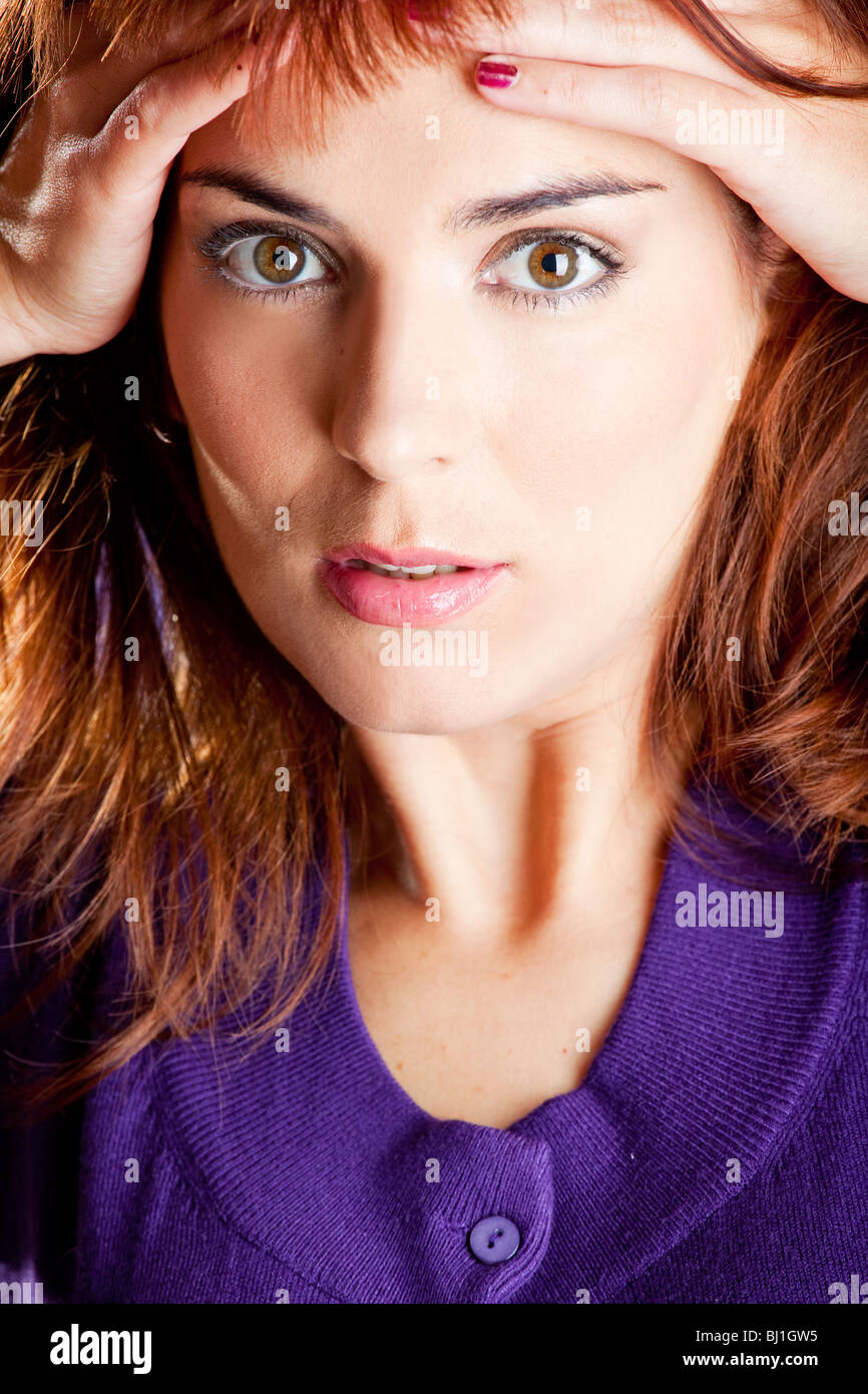 Portrait of a beautiful woman with a worried expression Stock Photo - Alamy