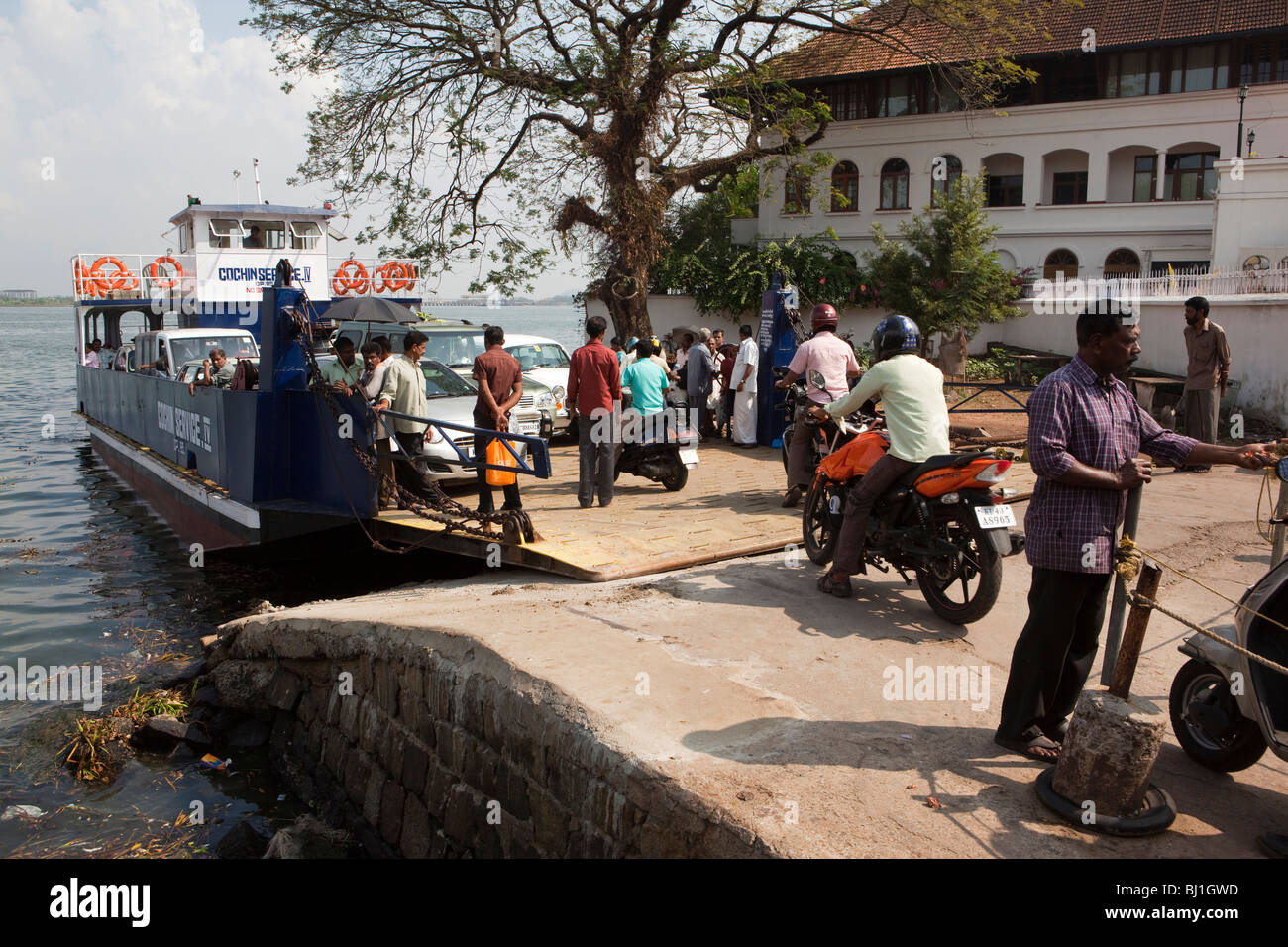 India, Kerala, Kochi, Fort Cochin, vehicles boarding car ferry at ...