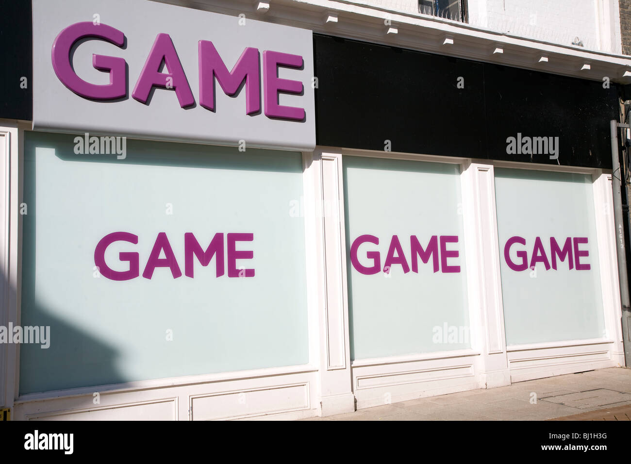 GAME shop sign window Stock Photo - Alamy
