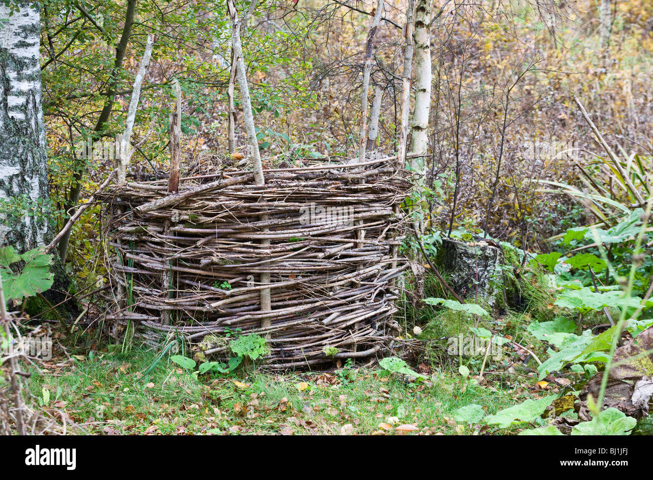 Garden waste in a compost built of branches Stock Photo - Alamy