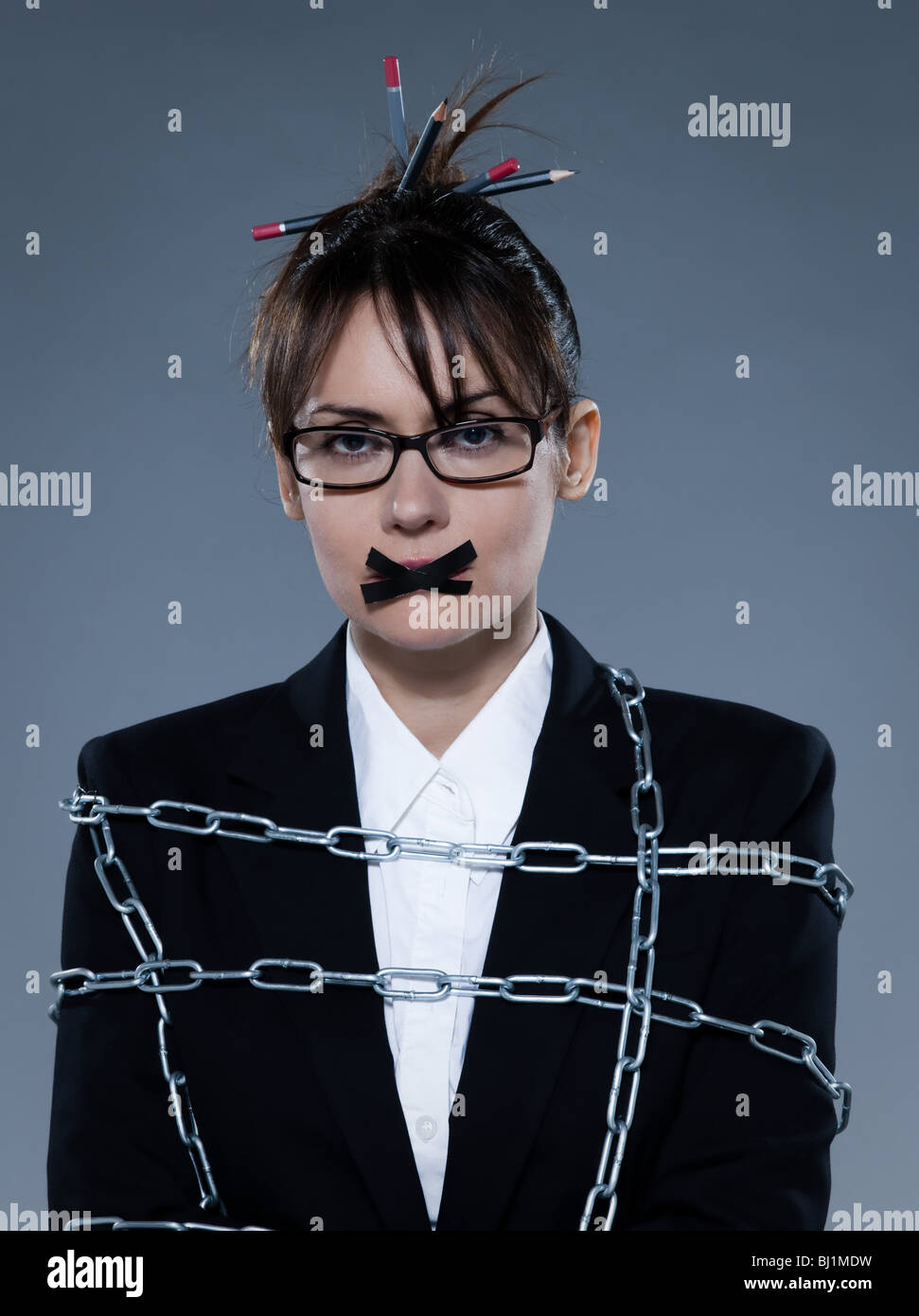 Women chained hi-res stock photography and images - Alamy