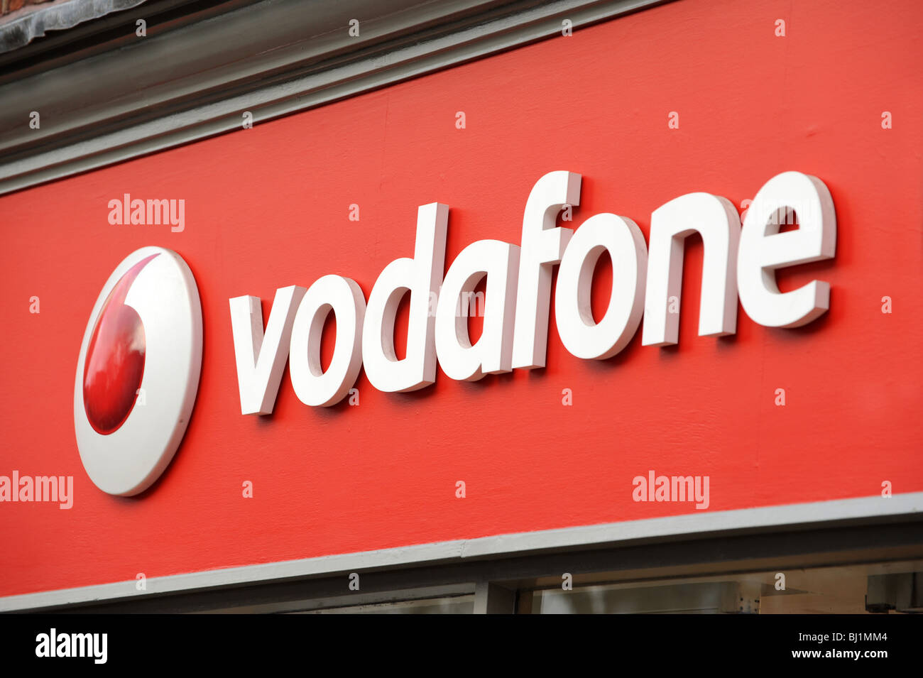 Vodafone shop sign England Uk Stock Photo - Alamy