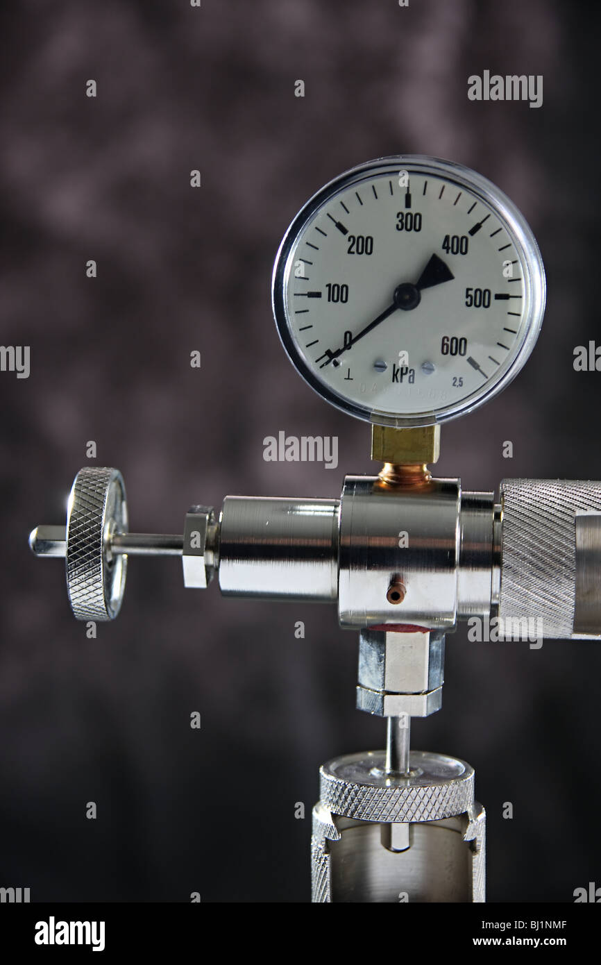 Macro of a manometer isolated on grey background Stock Photo - Alamy