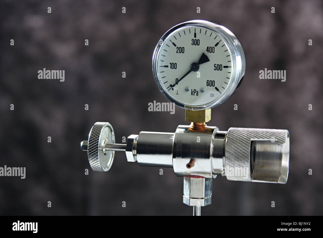 Macro of a manometer isolated on grey background Stock Photo - Alamy