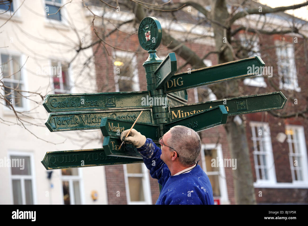 Painting visitor direction signs City of York in North Yorkshire ...