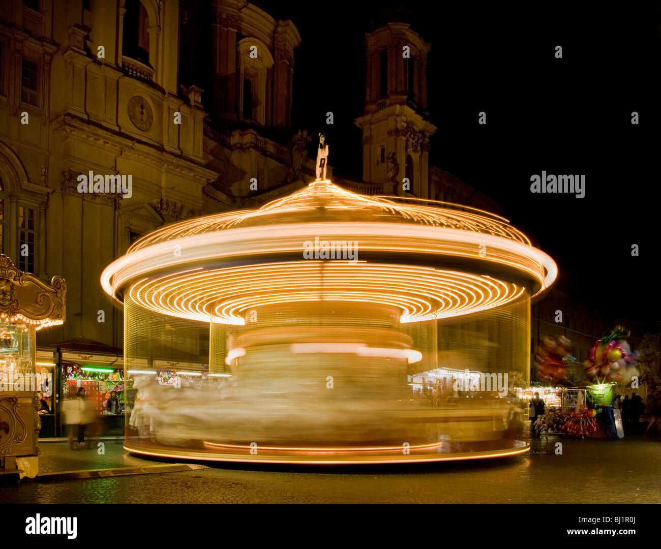 Fairground carousel at night in the Piazza Navona in Rome Italy Stock ...