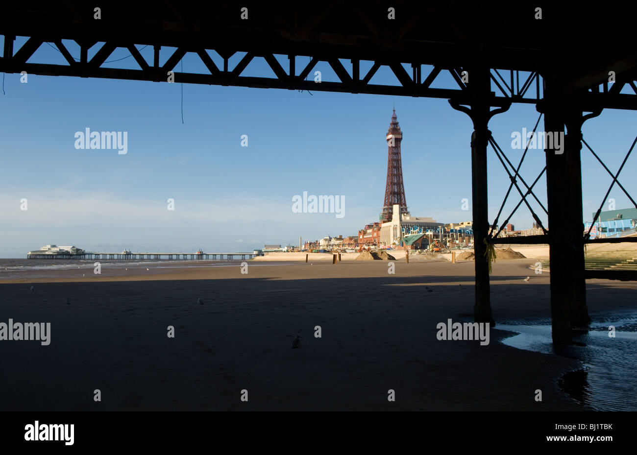 Blackpool Tower, the piers and the Pleasure Beach are the landmarks of ...
