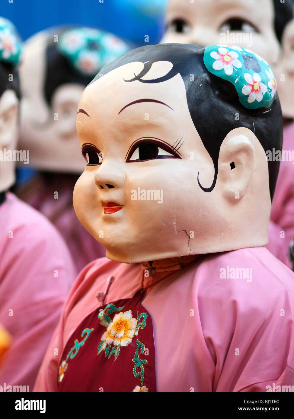 Performers with traditional masks at the Chinese New Year parade in the ...