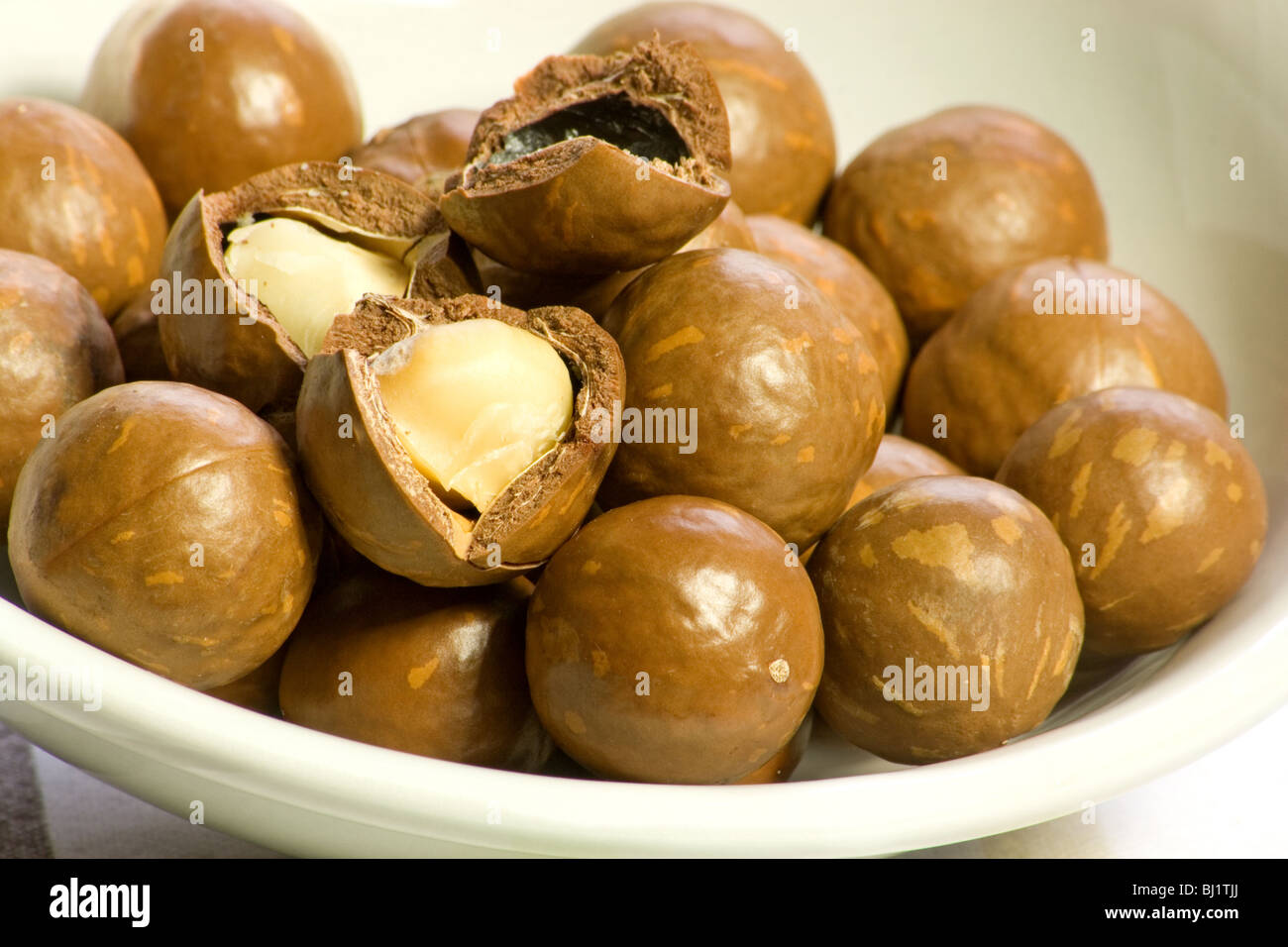 Macadamia nuts close-up Stock Photo - Alamy