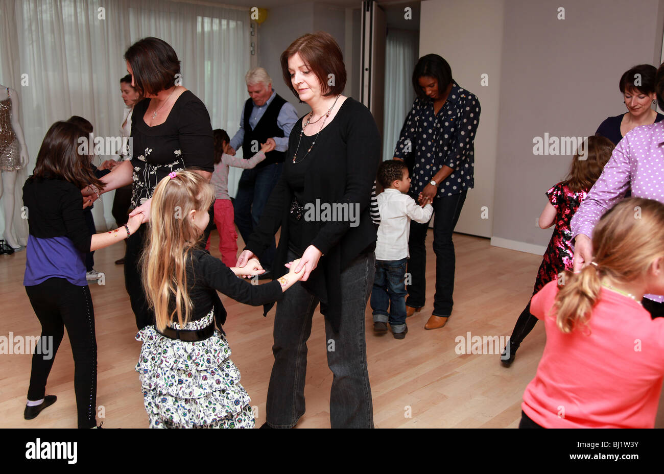 Parents and children at a dance class Stock Photo - Alamy