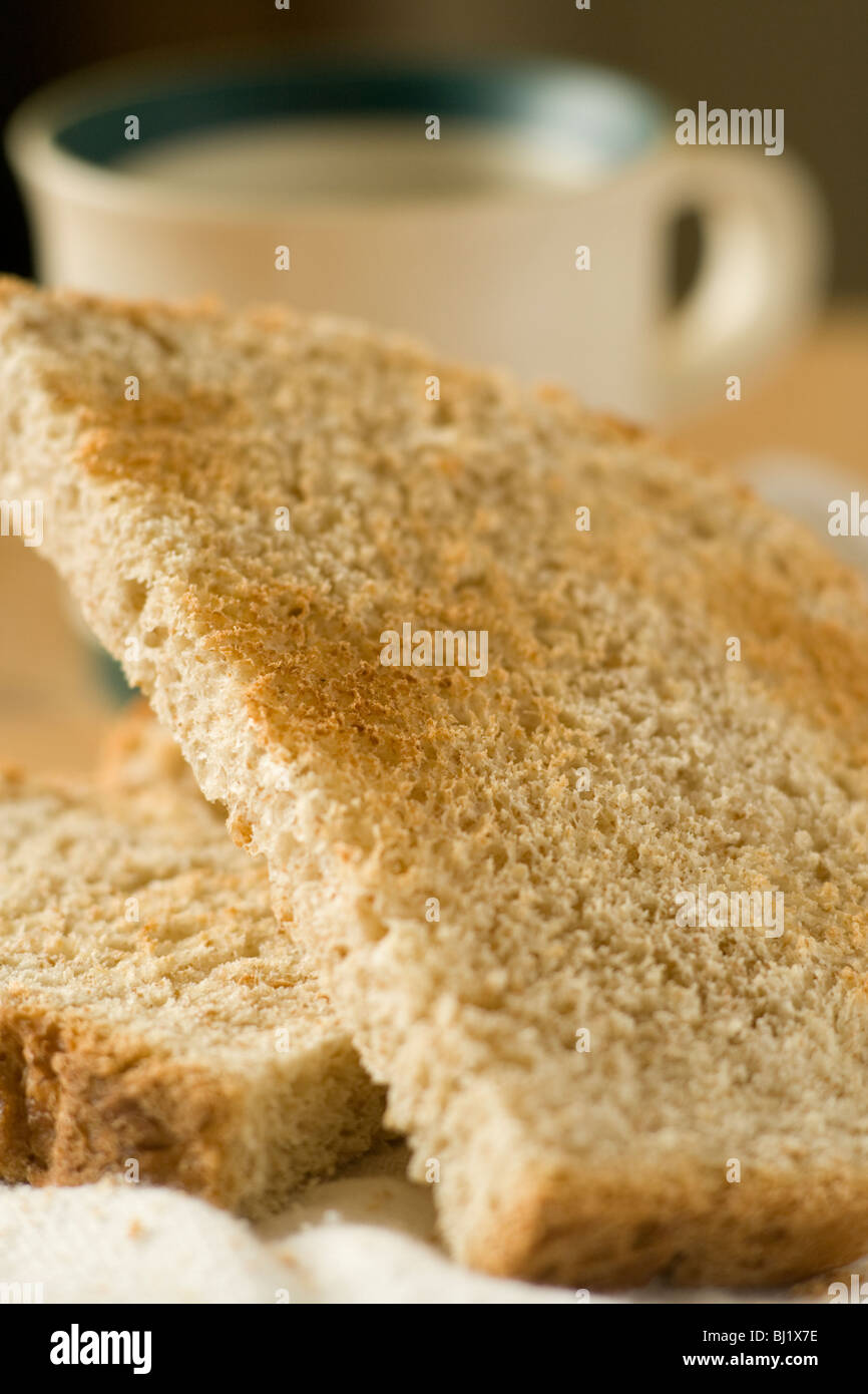 Wholemeal toast with mug Stock Photo - Alamy