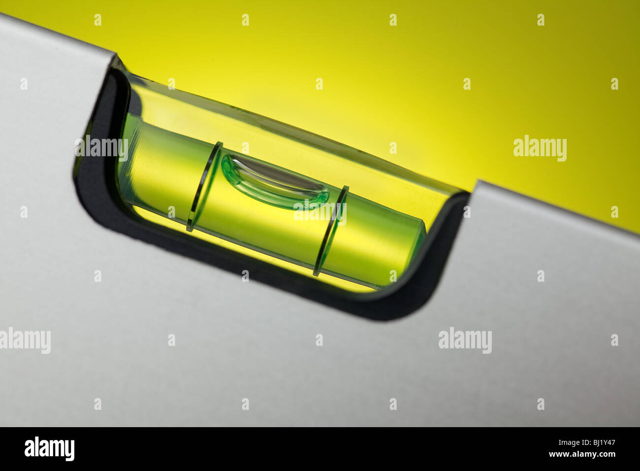 detail of spirit level with spot light on background Stock Photo - Alamy