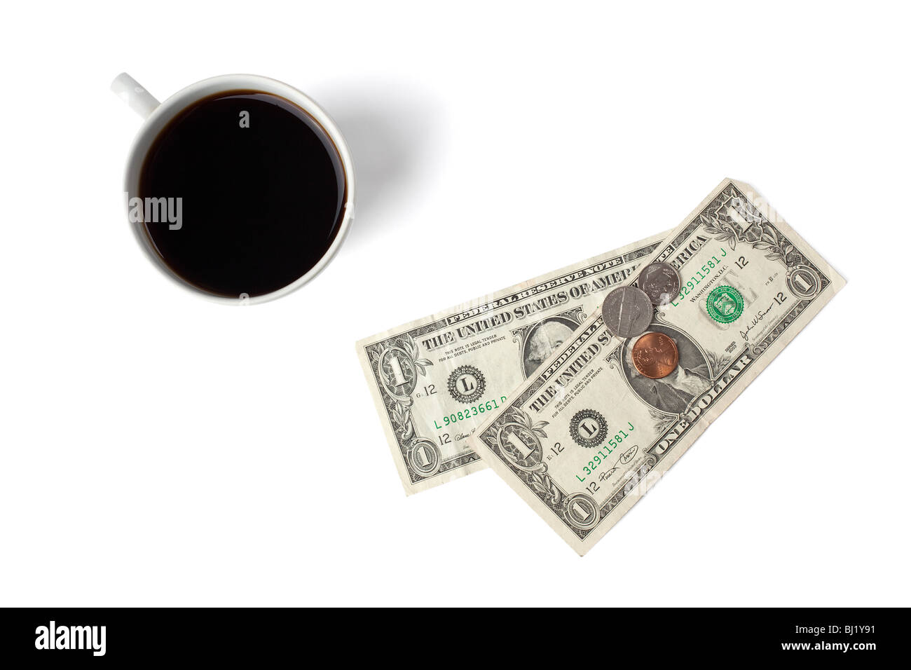 top shot of coffee cup with money on white background Stock Photo - Alamy