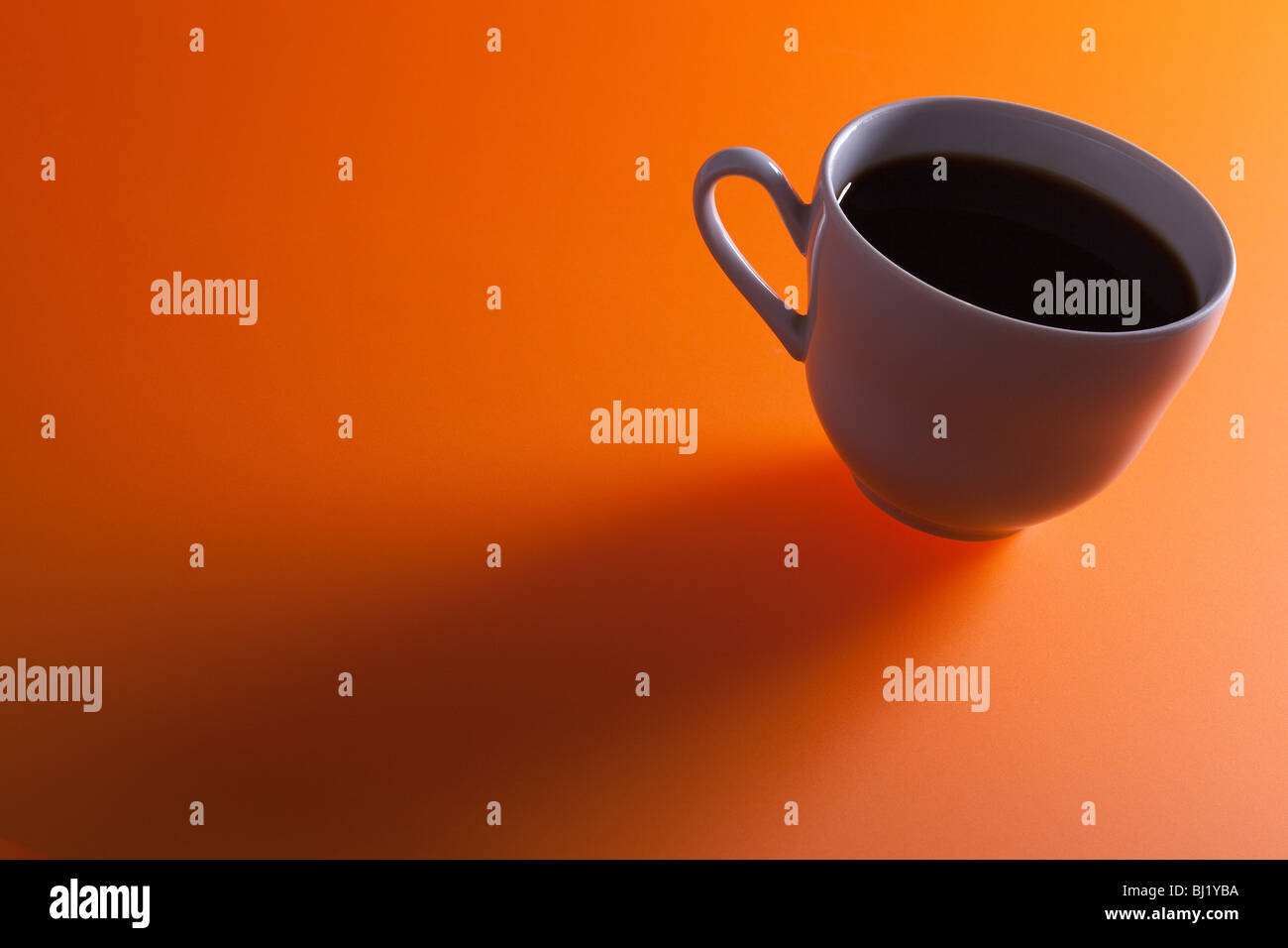 the white coffee cup on color background Stock Photo - Alamy