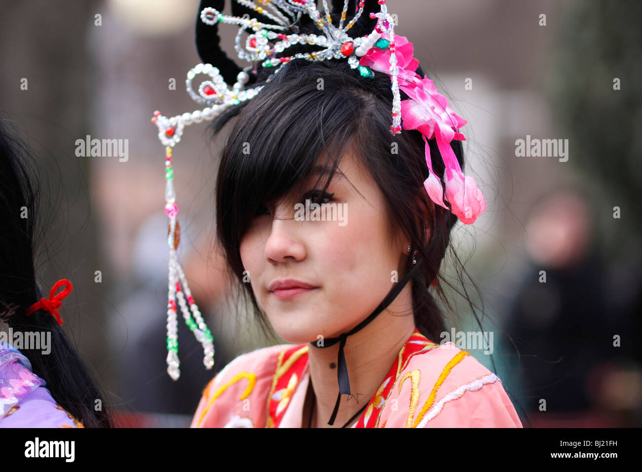 A female performer at the Chinese New Year parade in the streets of ...